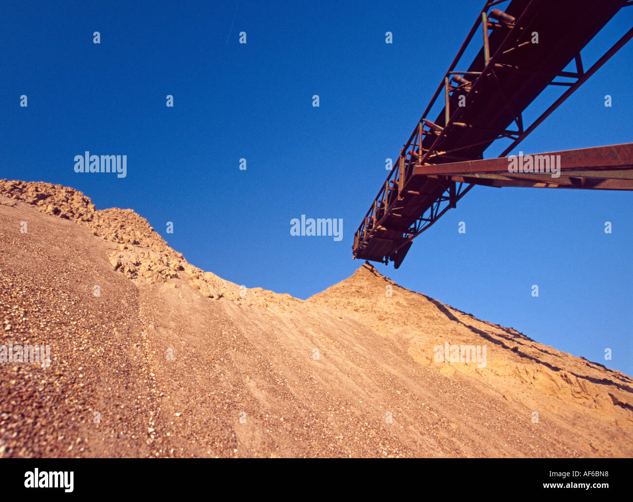 Conveyer belt in a sand pit Stock Photo - Alamy