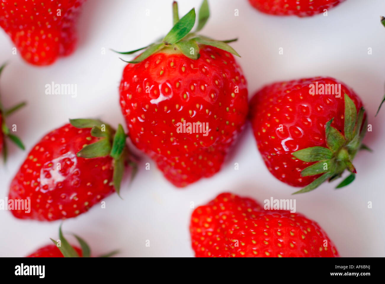 Five strawberries hi-res stock photography and images - Alamy