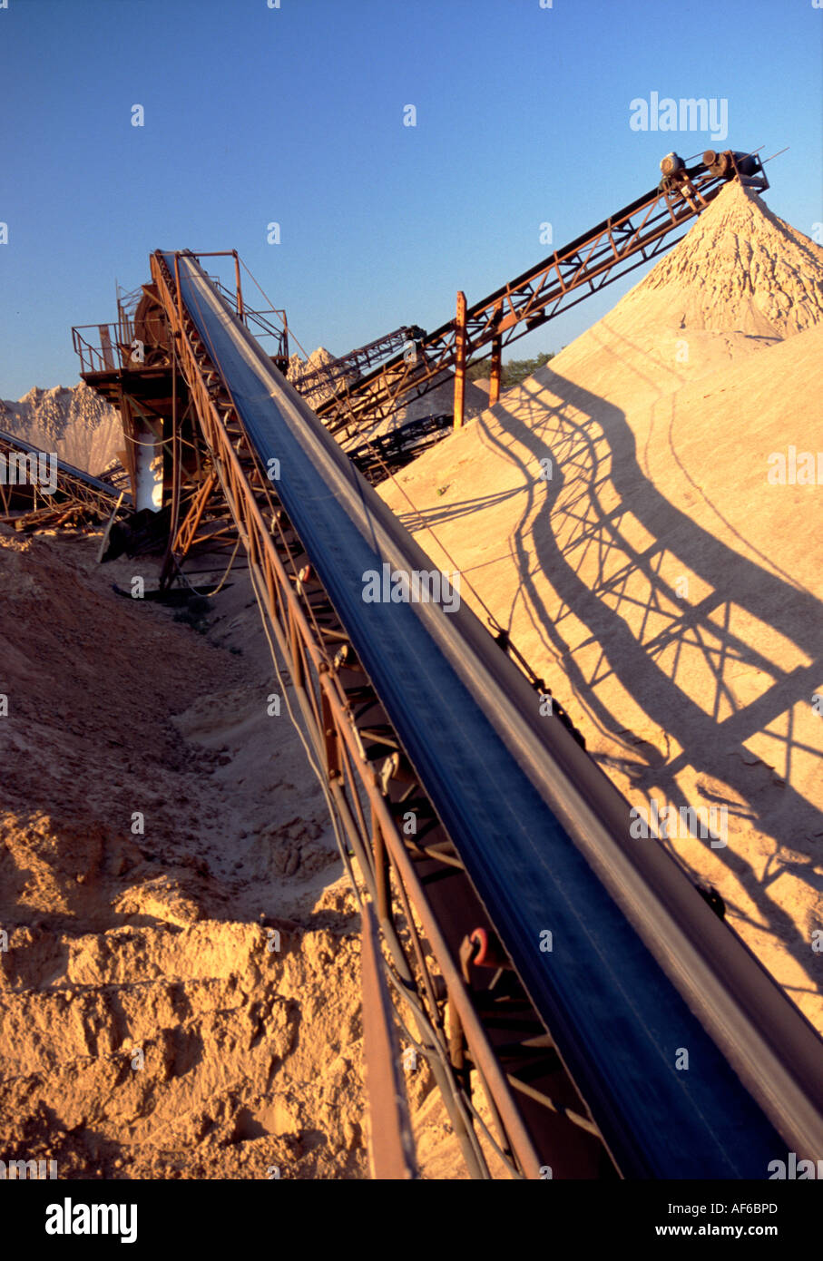 Conveyer belts in a sand pit Stock Photo - Alamy