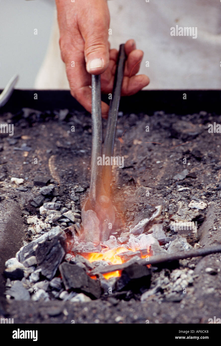 Forging of a blade for a knife Stock Photo - Alamy