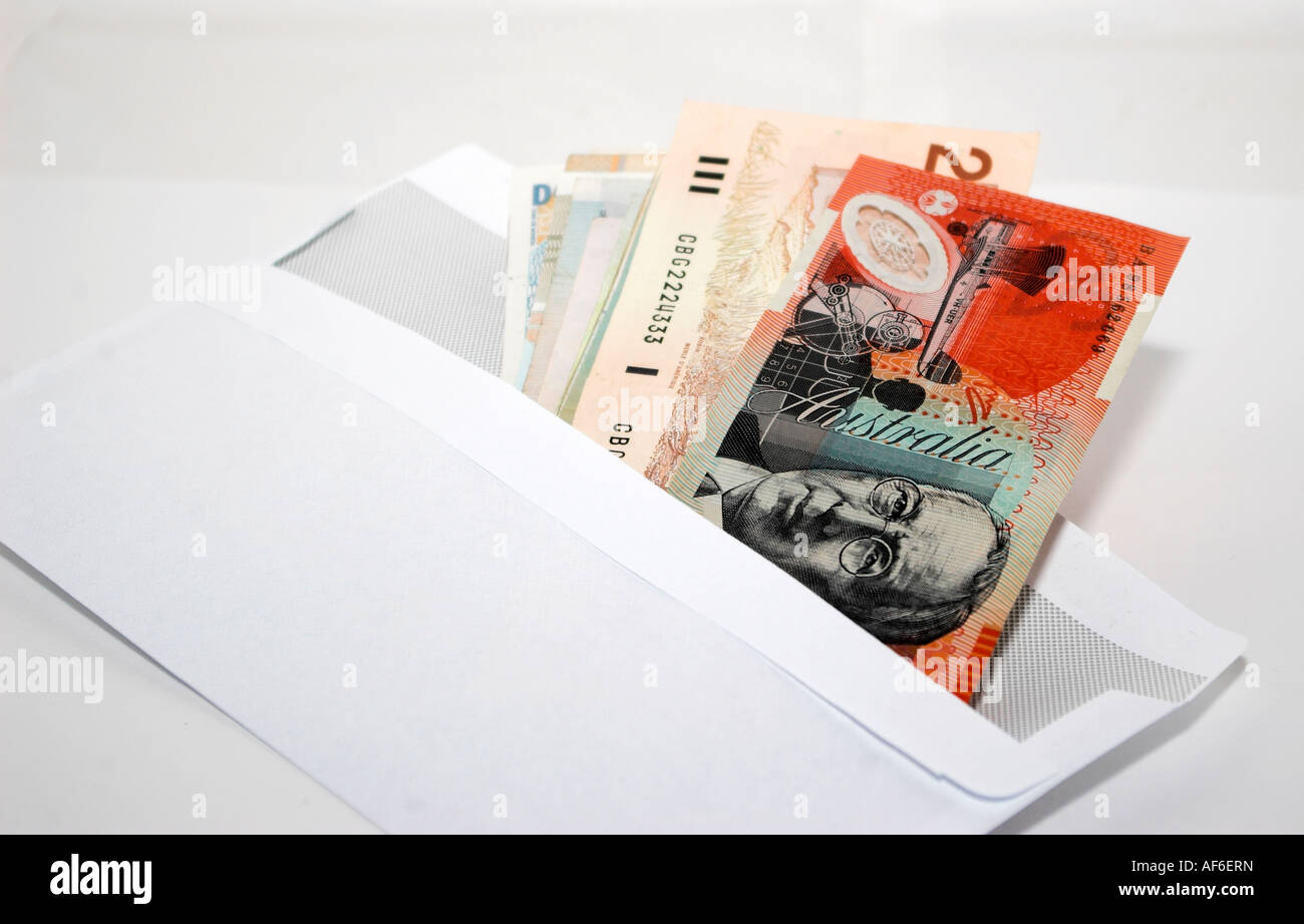 Currency in an envelope Stock Photo - Alamy