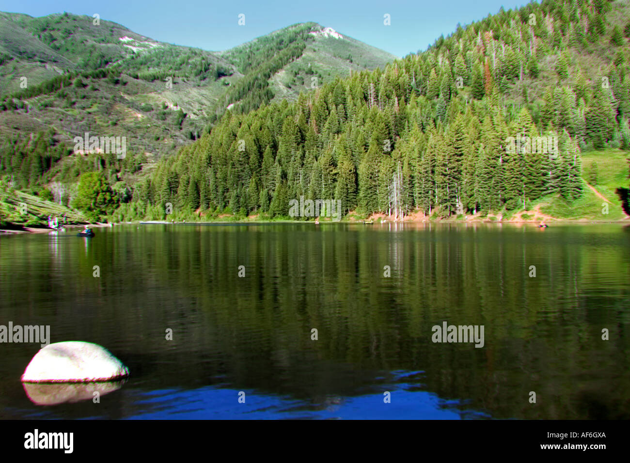 Mountain lake fishing reflection Stock Photo - Alamy