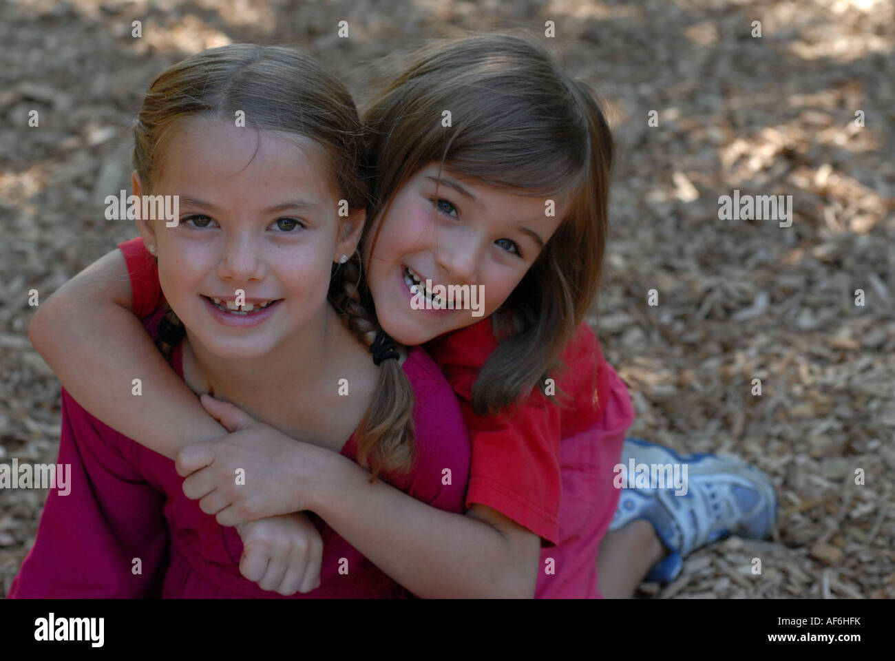 Two girls outdoor Stock Photo - Alamy