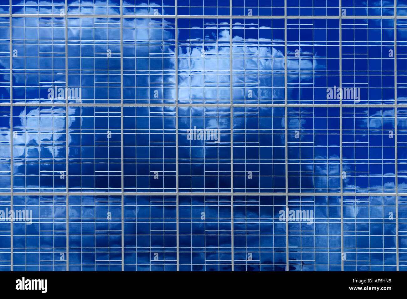 Window reflection blue clouds Stock Photo - Alamy