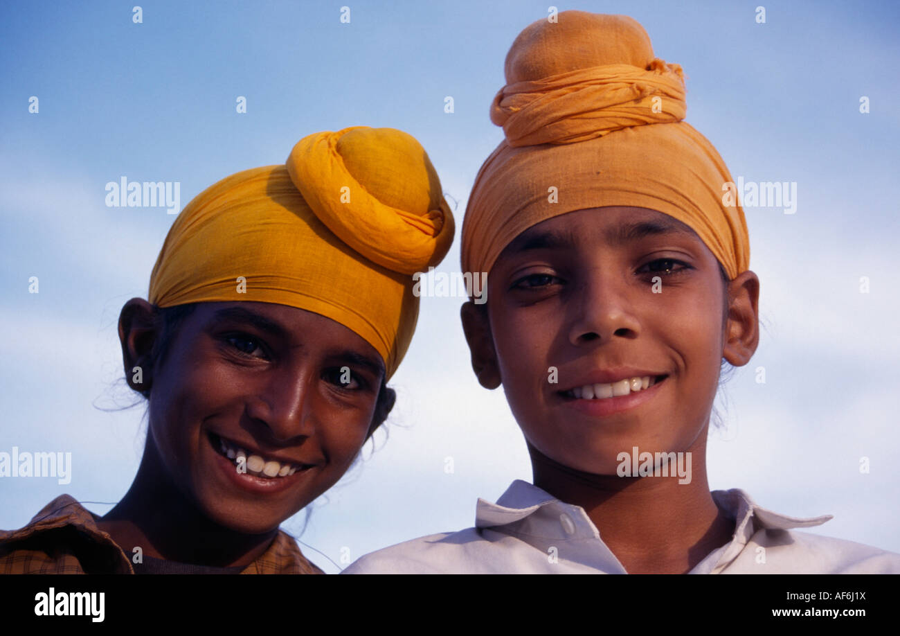 Two sikh boys head and shoulders portrait hi-res stock photography and ...