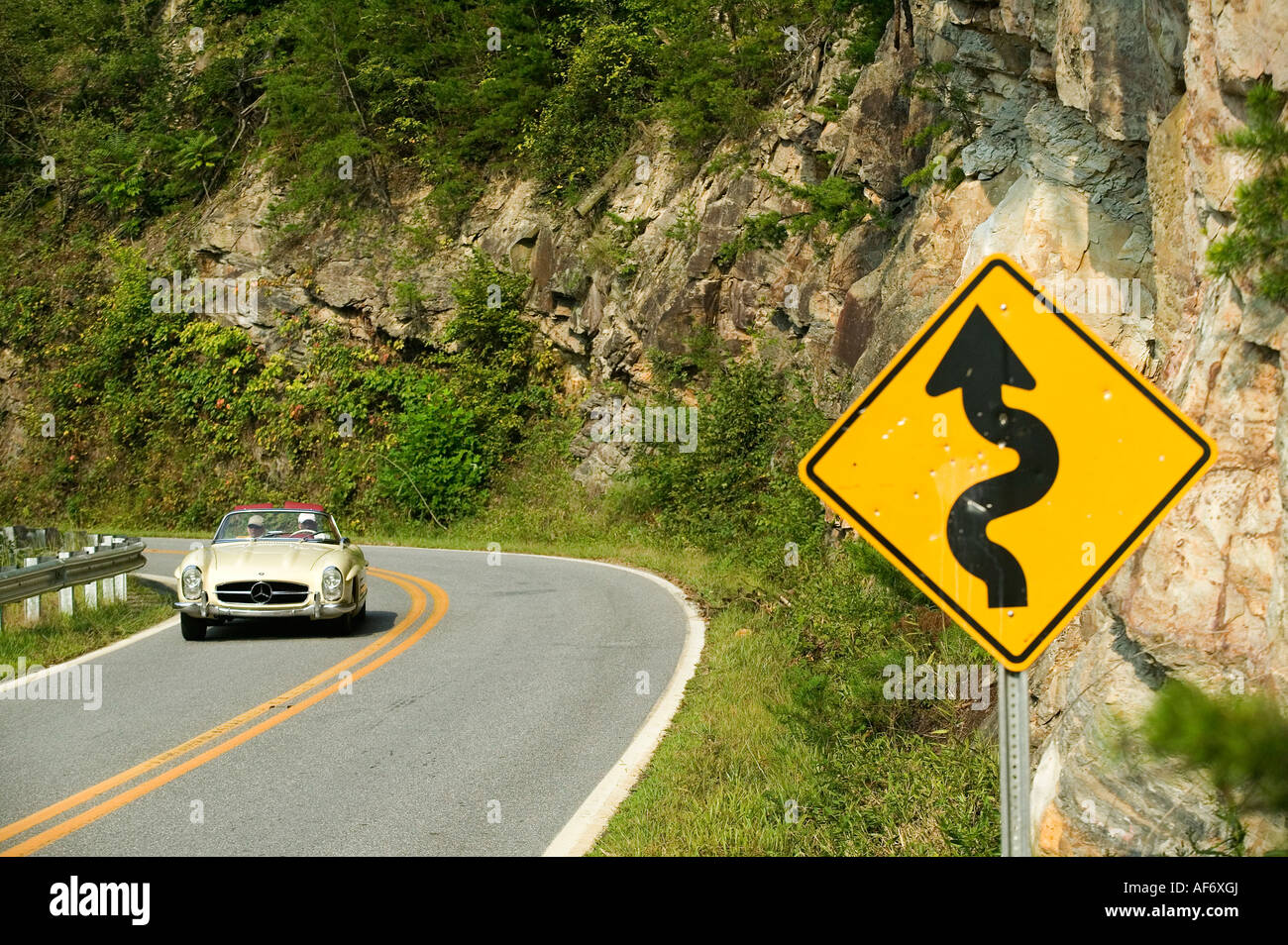 Classic car cornering on road in North Carolina USA Stock Photo - Alamy