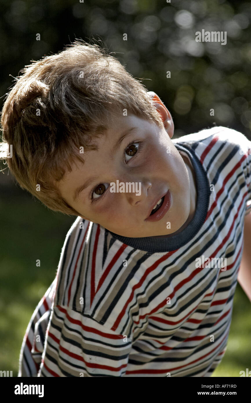 Young boy child outdoors in woods England UK NAOH Stock Photo - Alamy