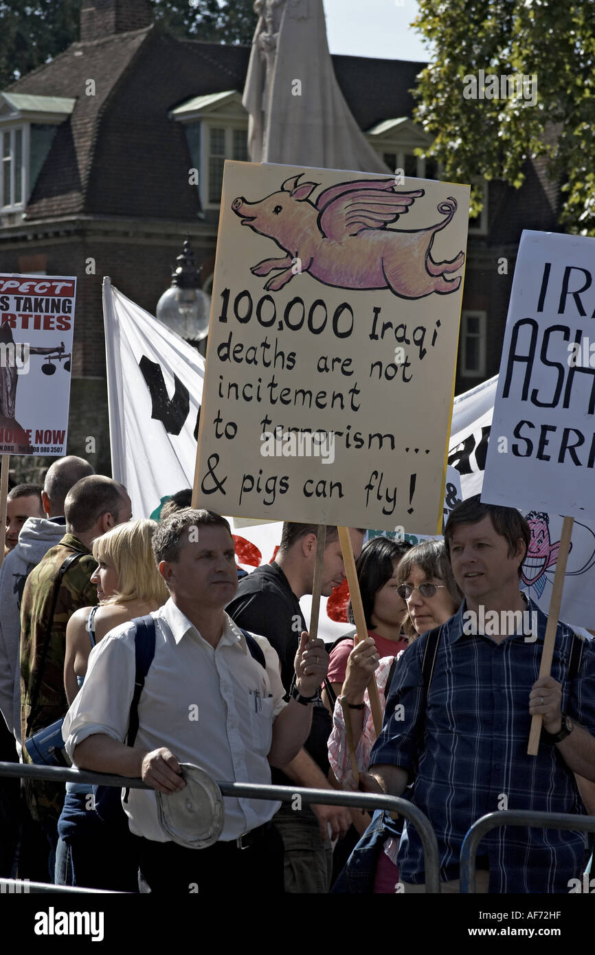Posters signs or banners on anti Iraq war protest demonstration march ...
