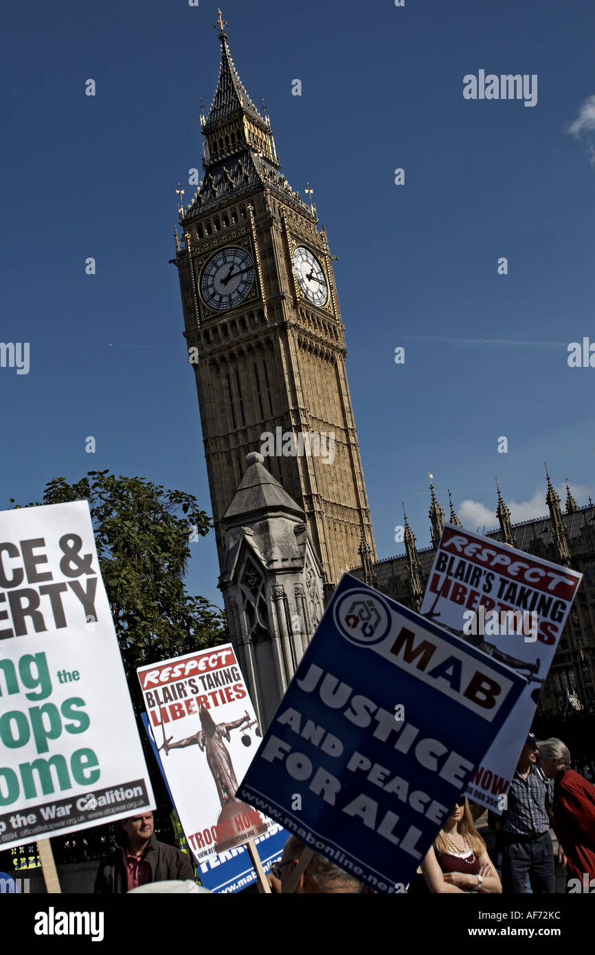 People outside falling Big Ben and Houses of Parliament with posters ...