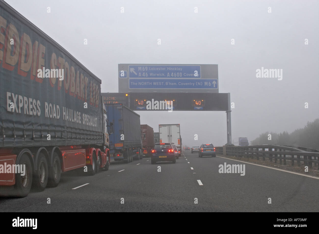 M6 Motorway with bad visibility dangerous driving conditions in fog and ...
