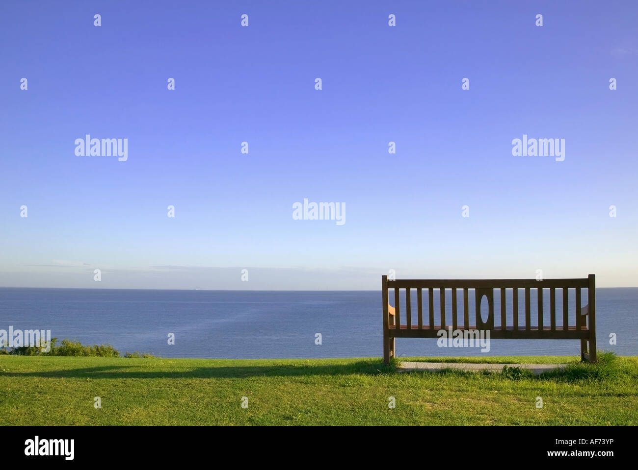 Empty bench looking out sea hi-res stock photography and images - Alamy