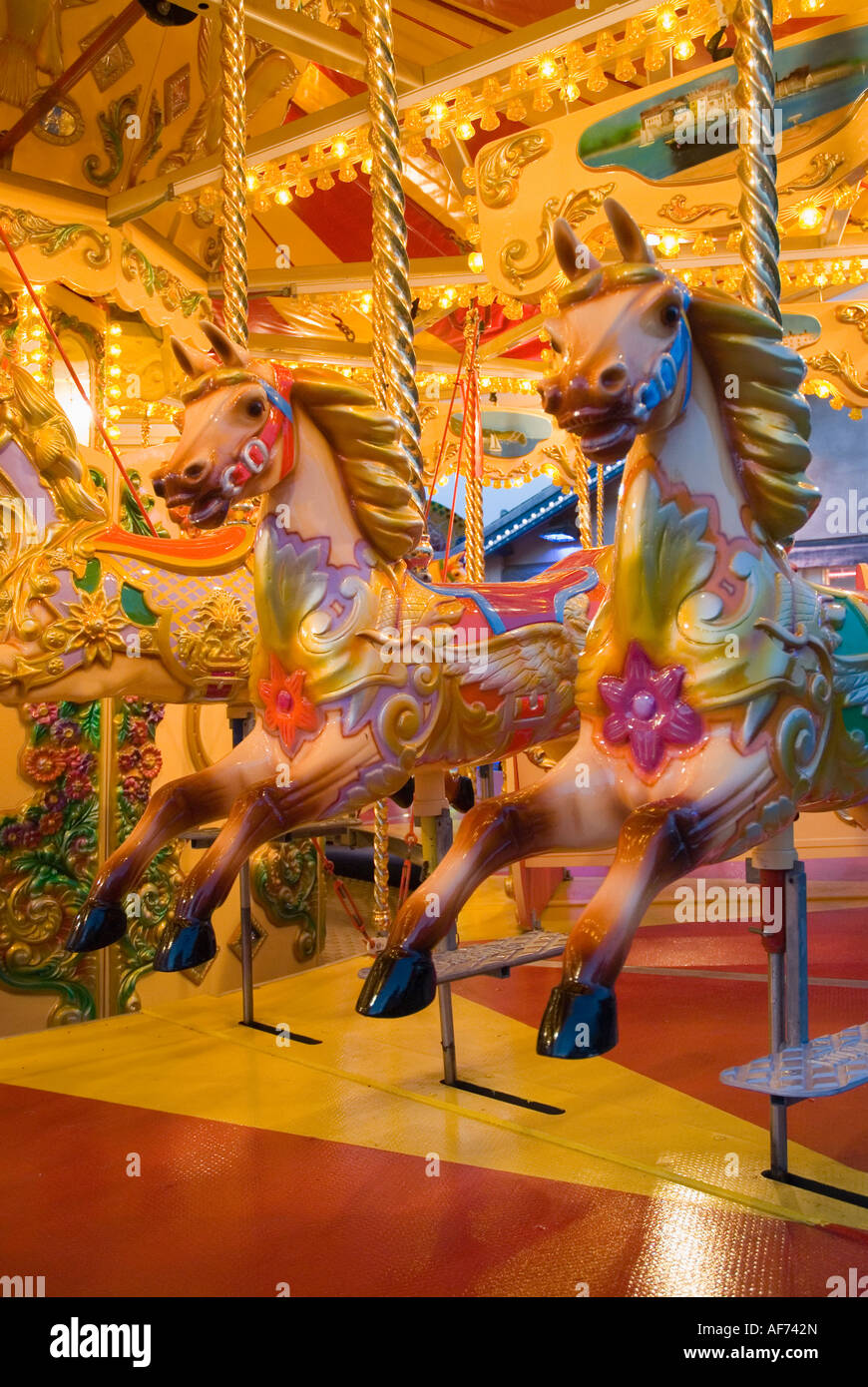 Fairground carousel ride at dusk Weymouth Dorset Stock Photo - Alamy
