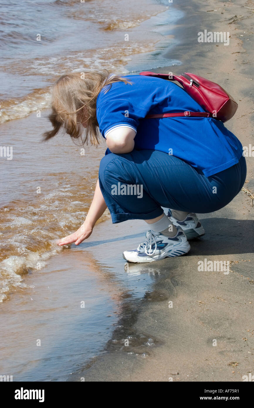 Touching crouch hi-res stock photography and images - Alamy