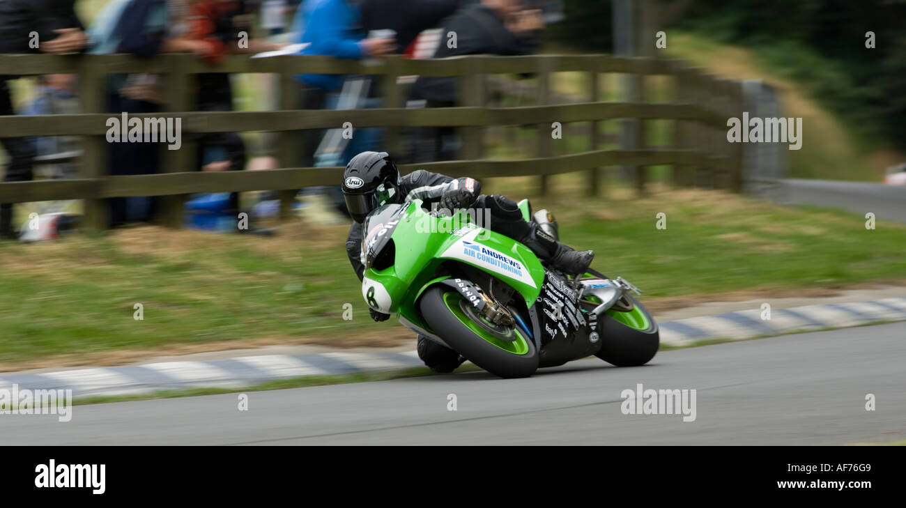 Superbike rider cornering at full speed Stock Photo - Alamy