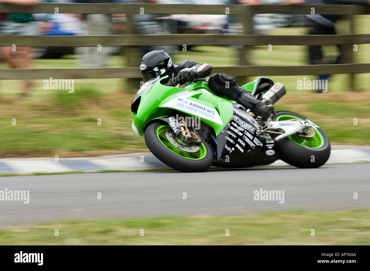 Superbike rider cornering at full speed Stock Photo - Alamy