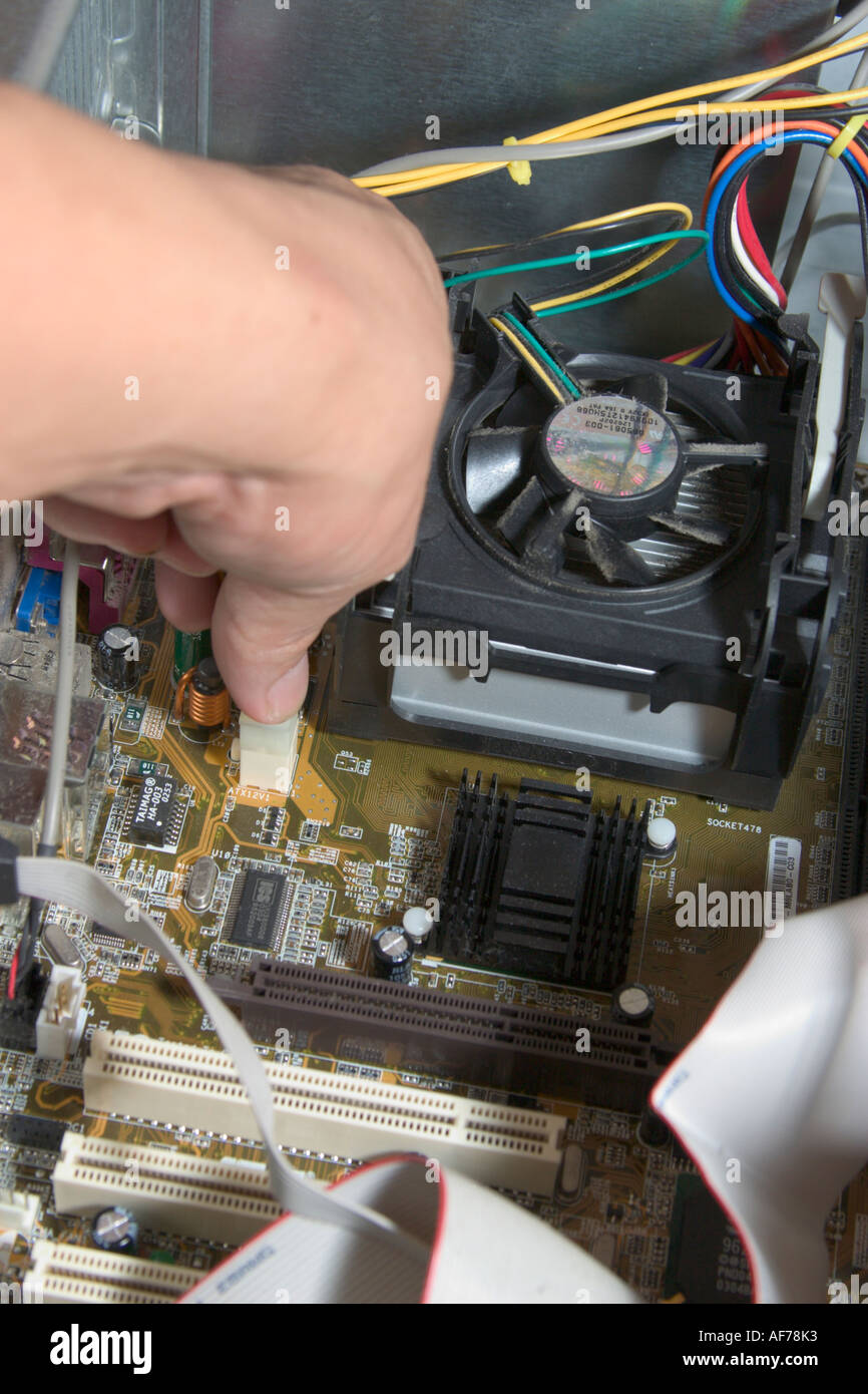 hand assembling cable of a personal computer Stock Photo - Alamy