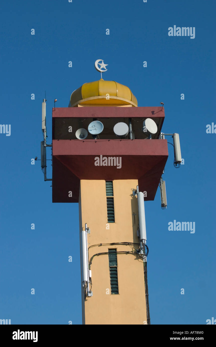 mosque minaret in malaysia with cellular phone antennas Stock Photo - Alamy