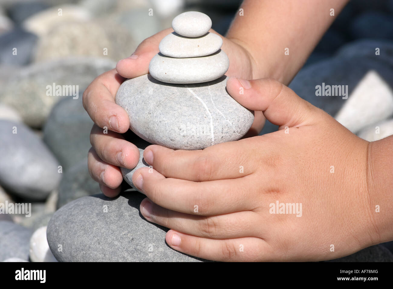 Hand made heap of pebbles Stock Photo - Alamy