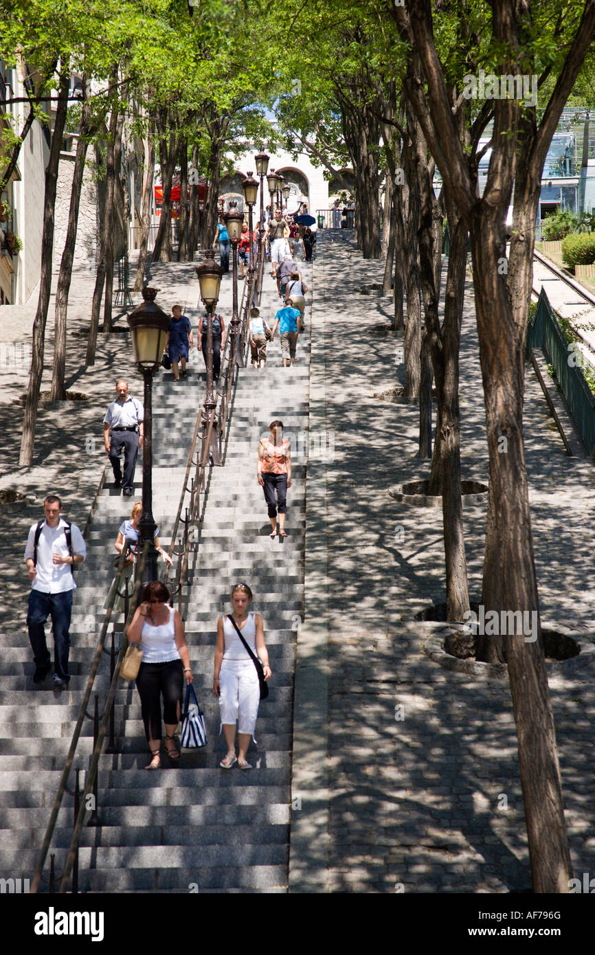 FRANCE Ile de France Paris Montmartre People on tree lined steps of Rue ...