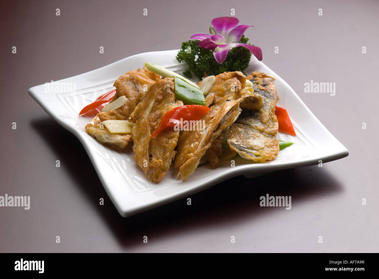 Chinese Food Fire Fish Head Stock Photo - Alamy