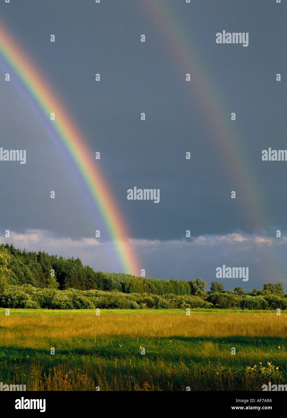 Poland. Double rainbow over countryside Stock Photo - Alamy