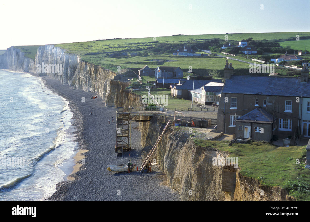 Houses on the edge of the Cliff at Birling Gap in East Sussex England ...