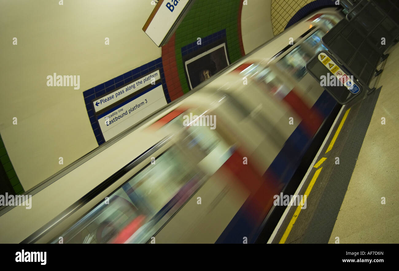 Underground Train Passing Through Tube Station Stock Photo - Alamy