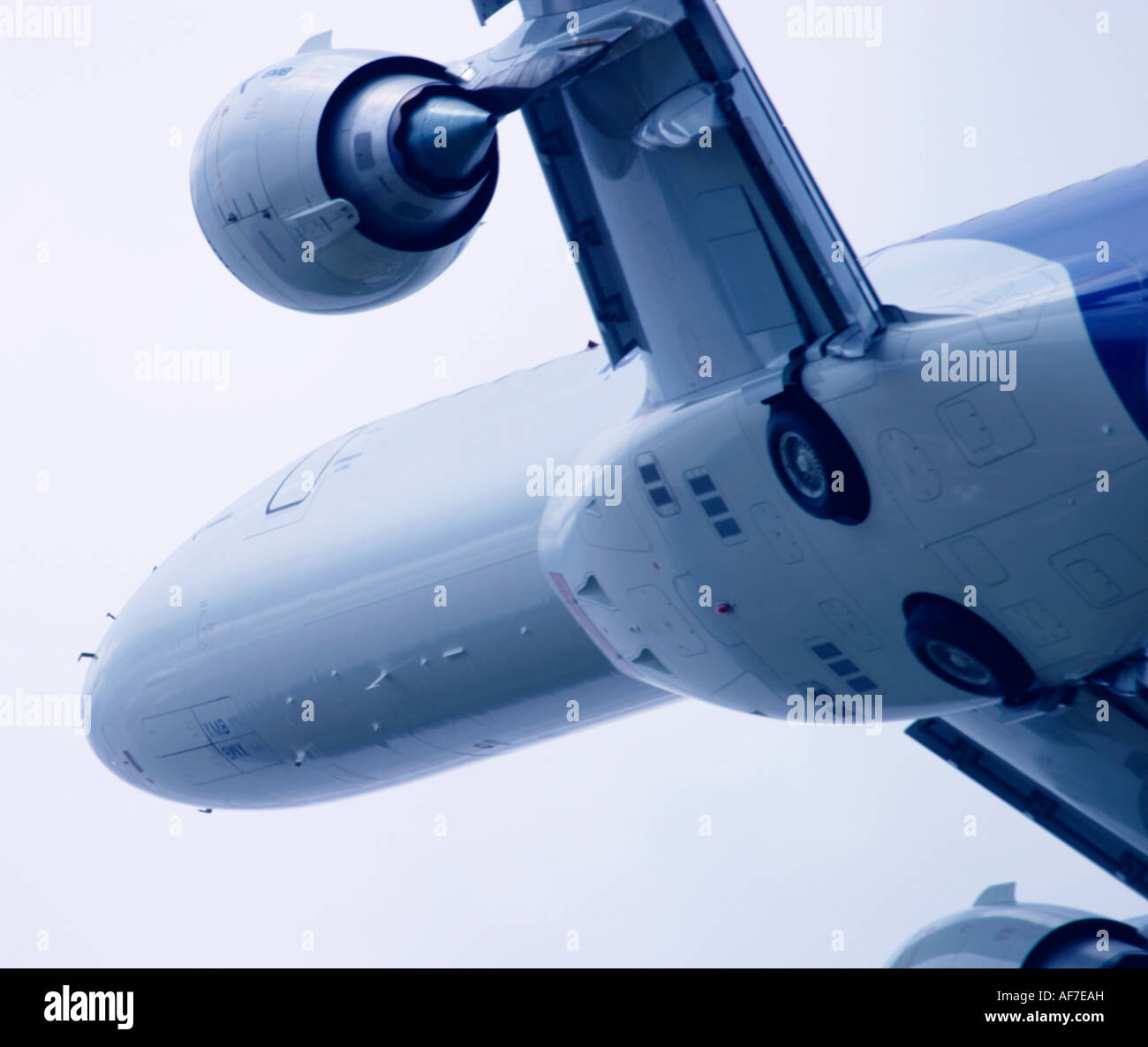 Aeroplane flying close up Stock Photo - Alamy