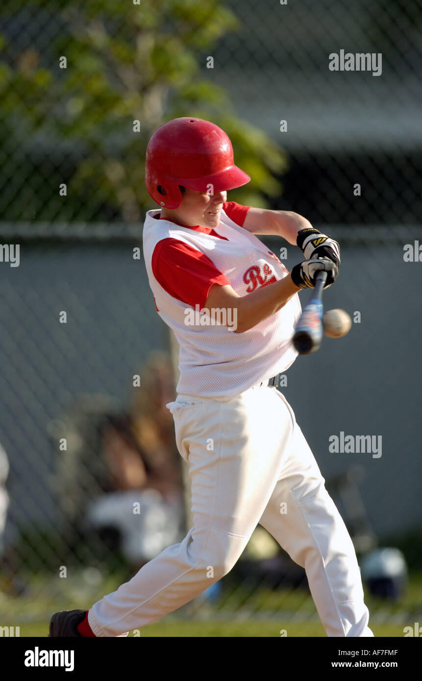 Baseball Player Hitting A Ball at April Langdon blog