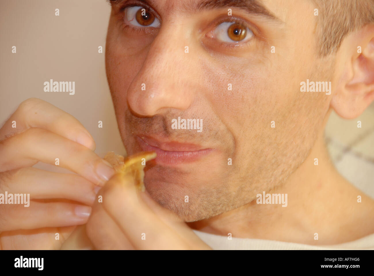 man eating potato food Stock Photo - Alamy
