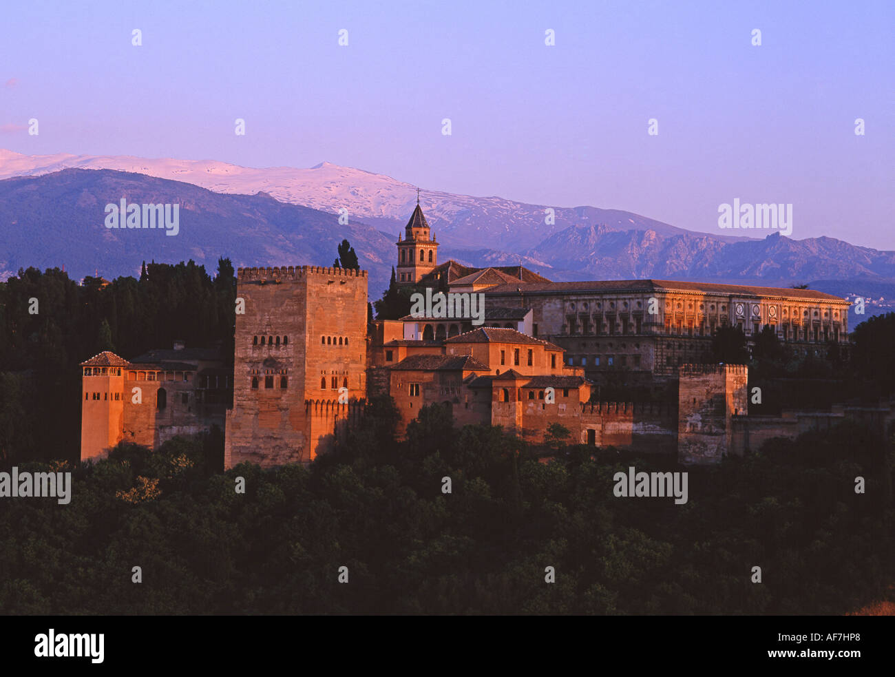 Alhambra Palace at sunset Granada Sierra Nevada in background Andalucia ...