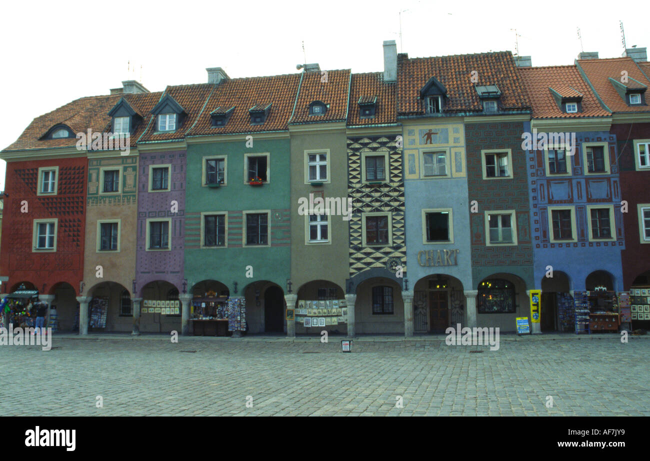 Brightly coloured buildings in the Starry Rynek Square, Poznan, Poland ...