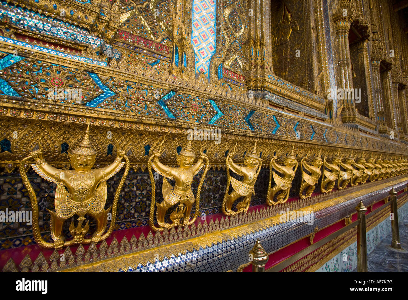Row of figures showing Garuda King of Birds holding Naga the King of ...