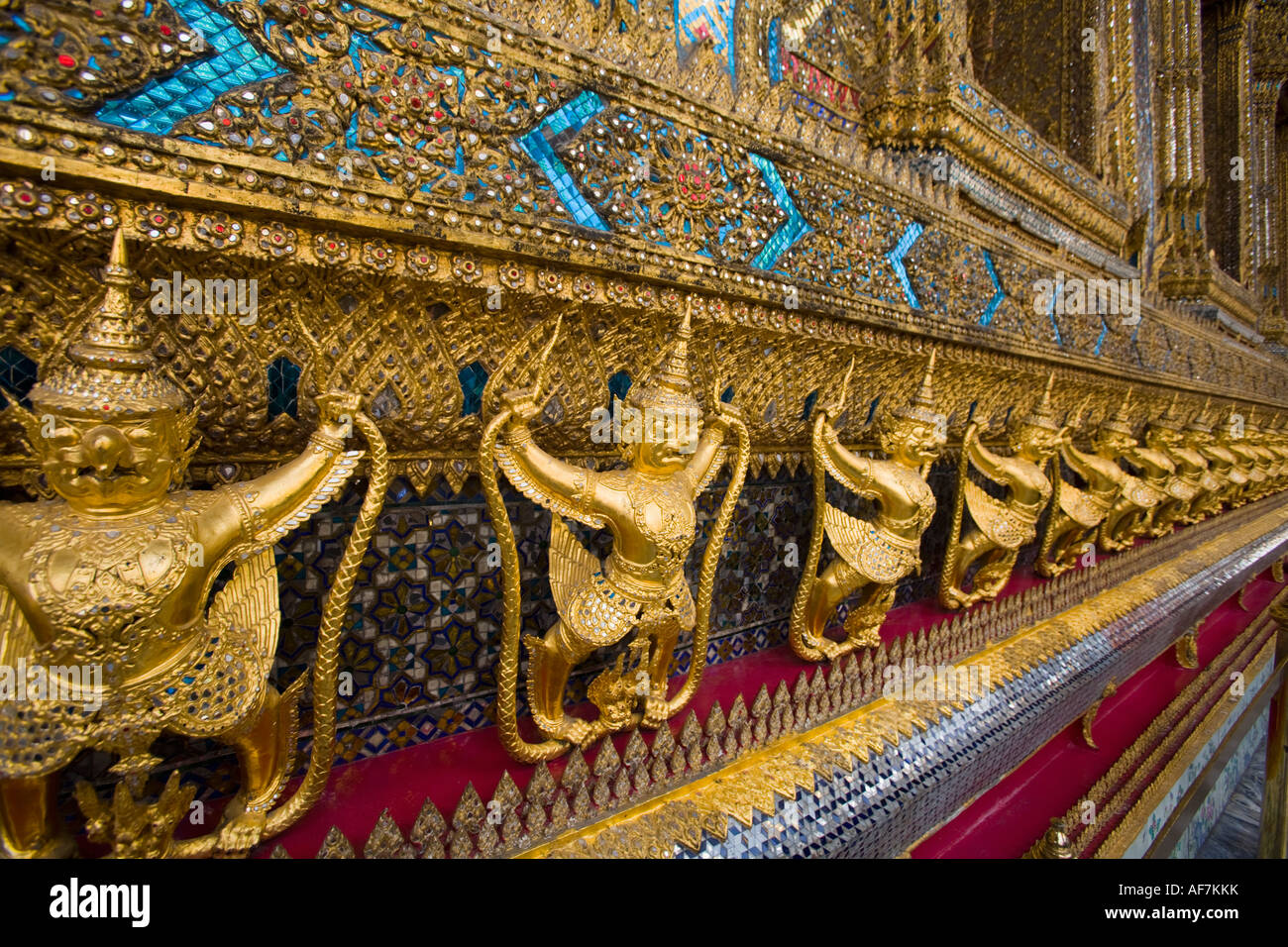 Row of figures showing Garuda King of Birds holding Naga the King of ...