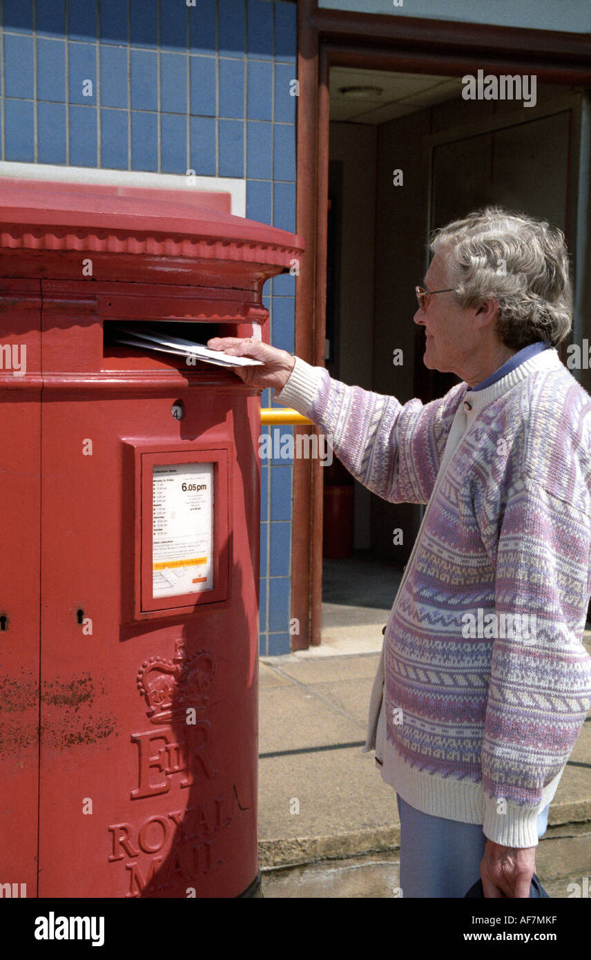 Old woman posting letters hi-res stock photography and images - Alamy