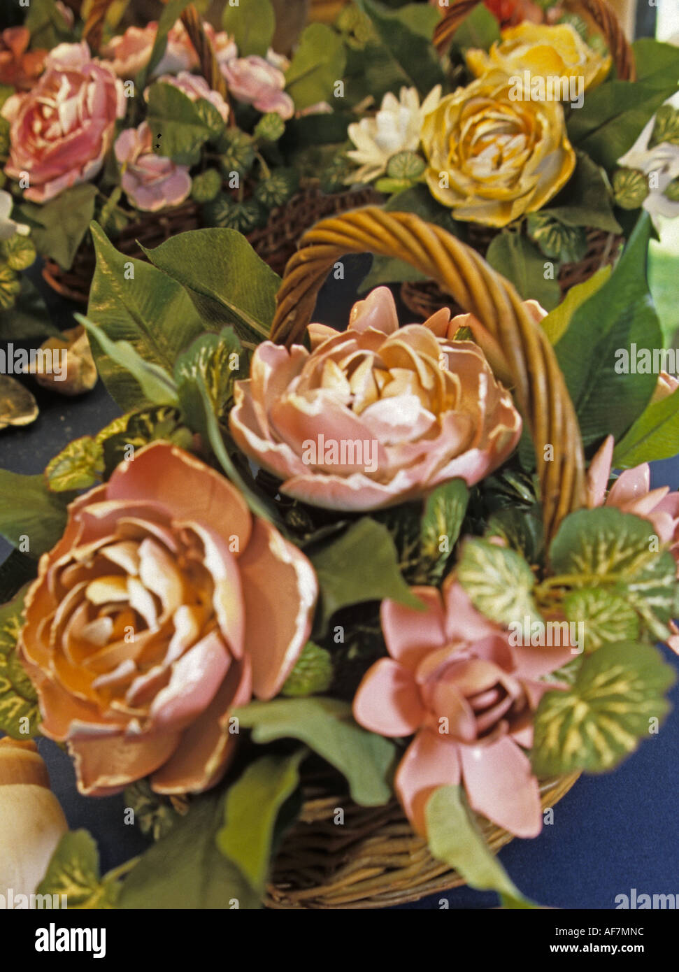 shell flower arrangement in a basket Stock Photo - Alamy