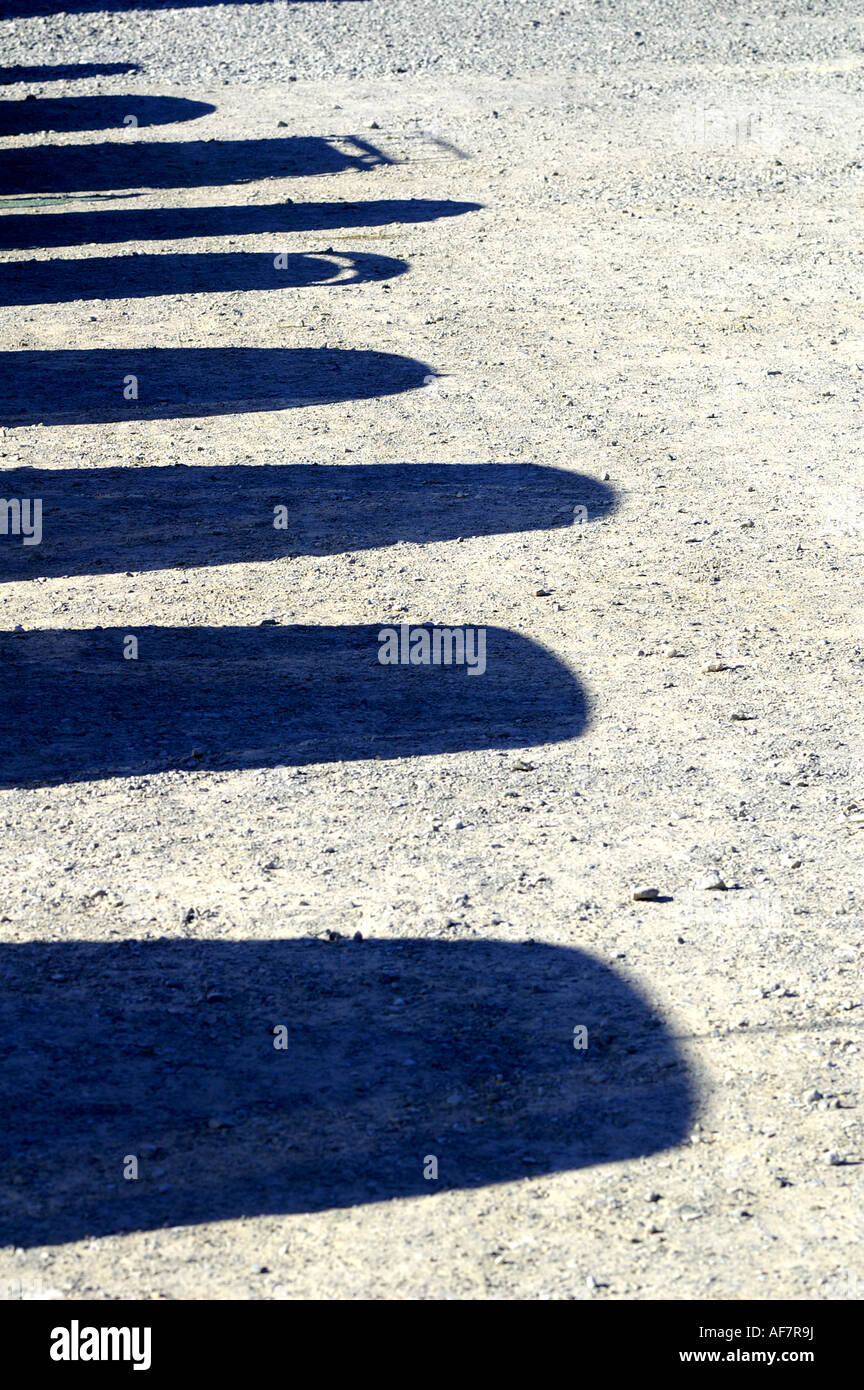 cars shadows on the gravel car park Stock Photo - Alamy