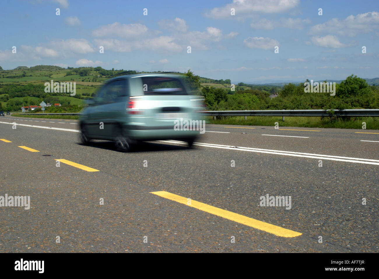 Car driving on an open highway Stock Photo - Alamy