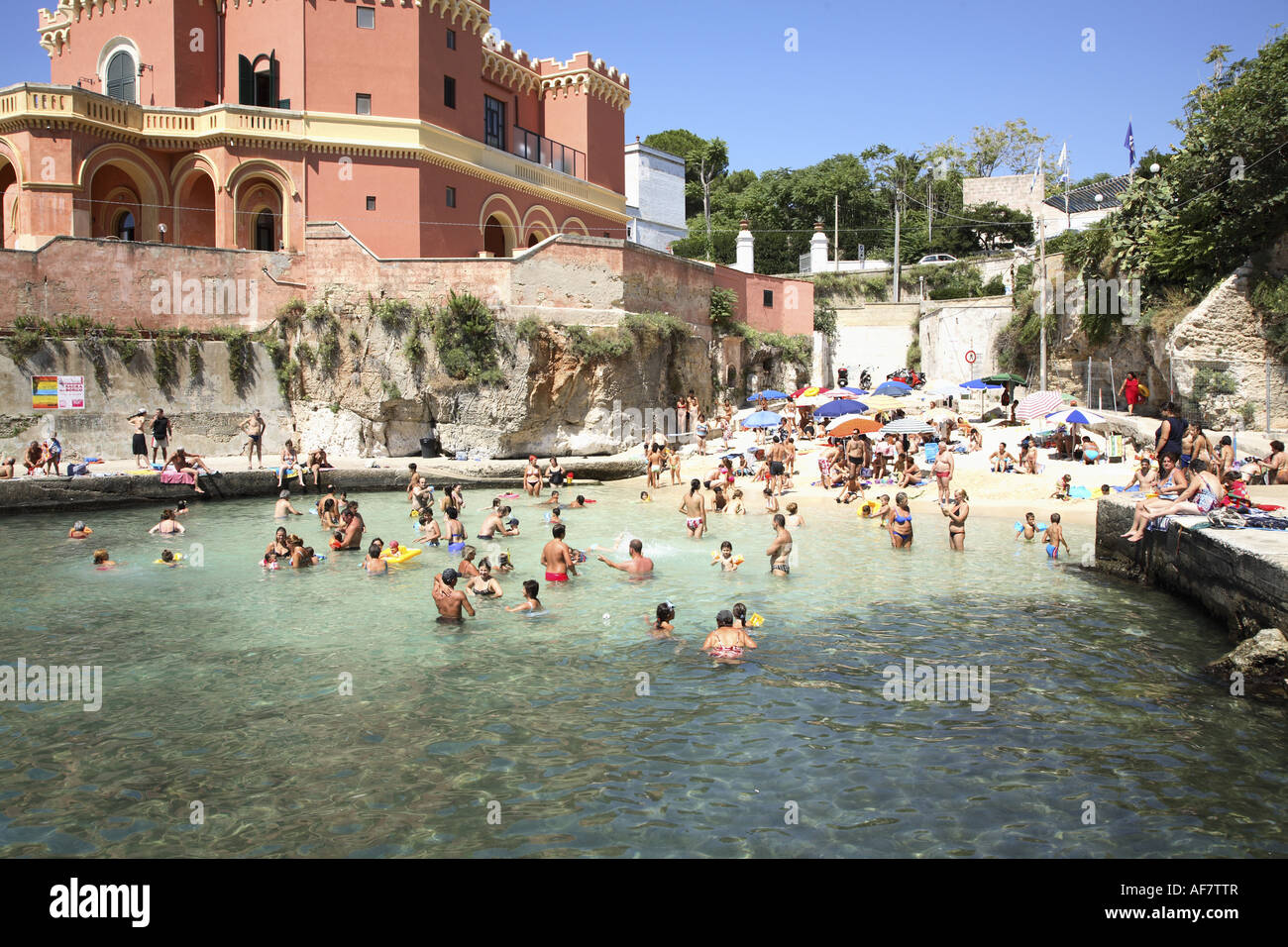 Santa Maria di Leuca, Puglia, Italy, people on the beach having a bath ...