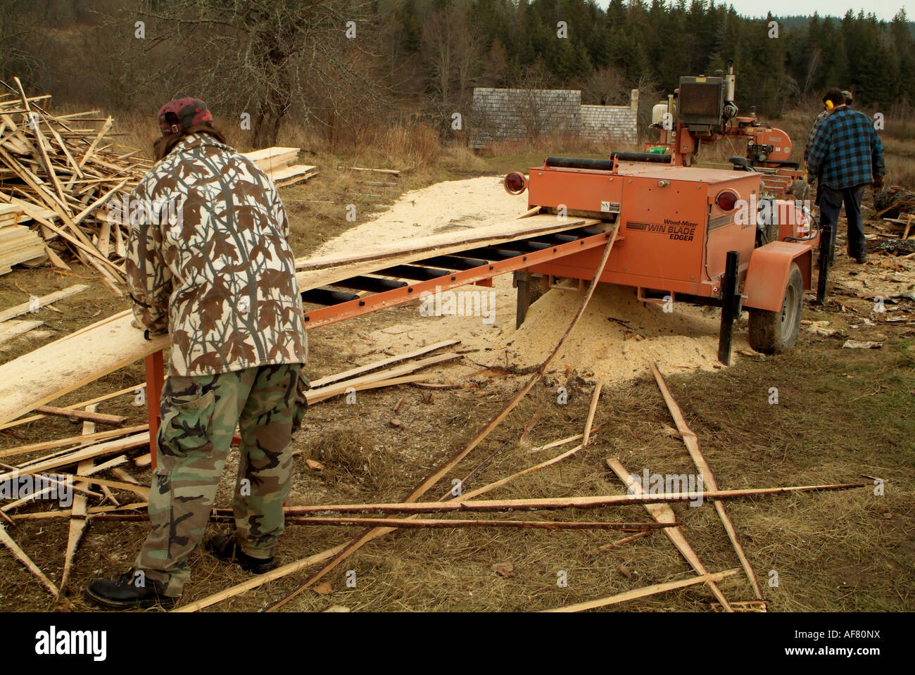 man planing wood Stock Photo - Alamy