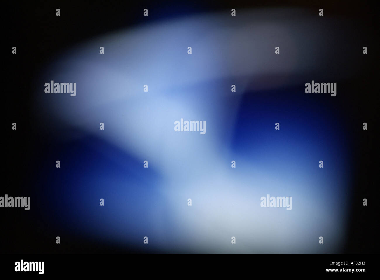 Abstract blurry figure in blue Stock Photo - Alamy
