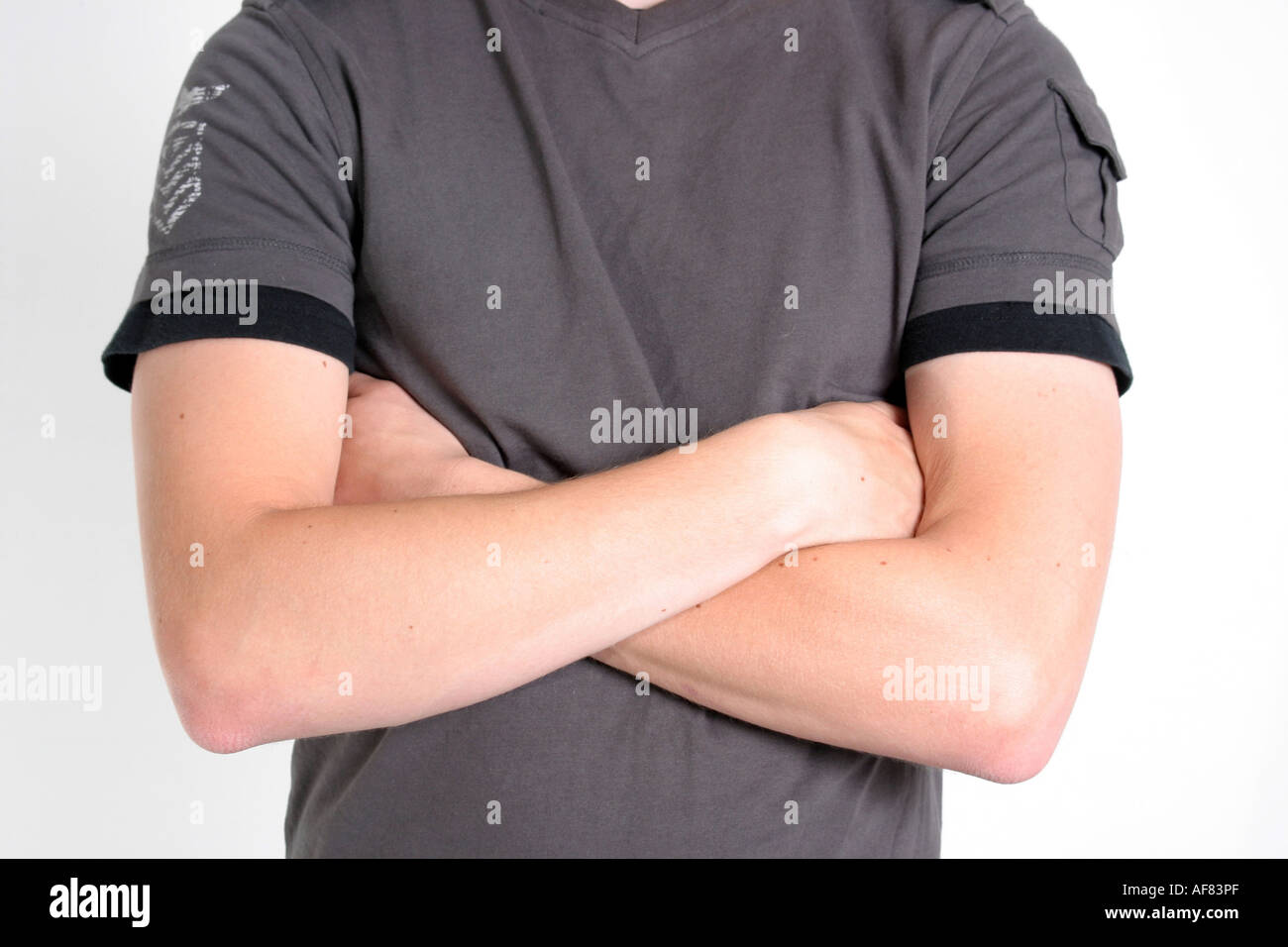 A Stock Photograph of a Male with His Arms Crossed Stock Photo - Alamy