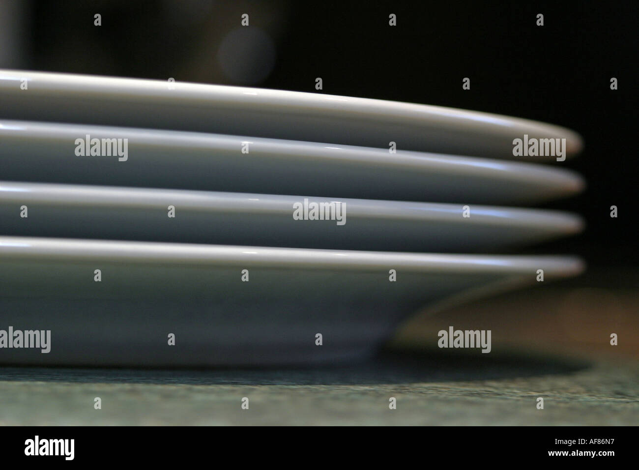 A Stock Photograph of a Pile of Plates in a Kitchen Stock Photo - Alamy