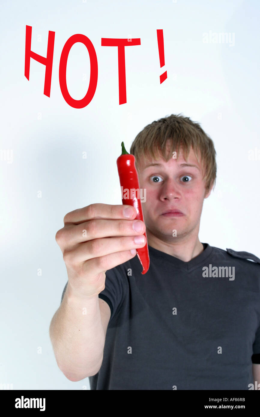 A Stock Photograph of a University Student Holding a Chilli Stock Photo ...