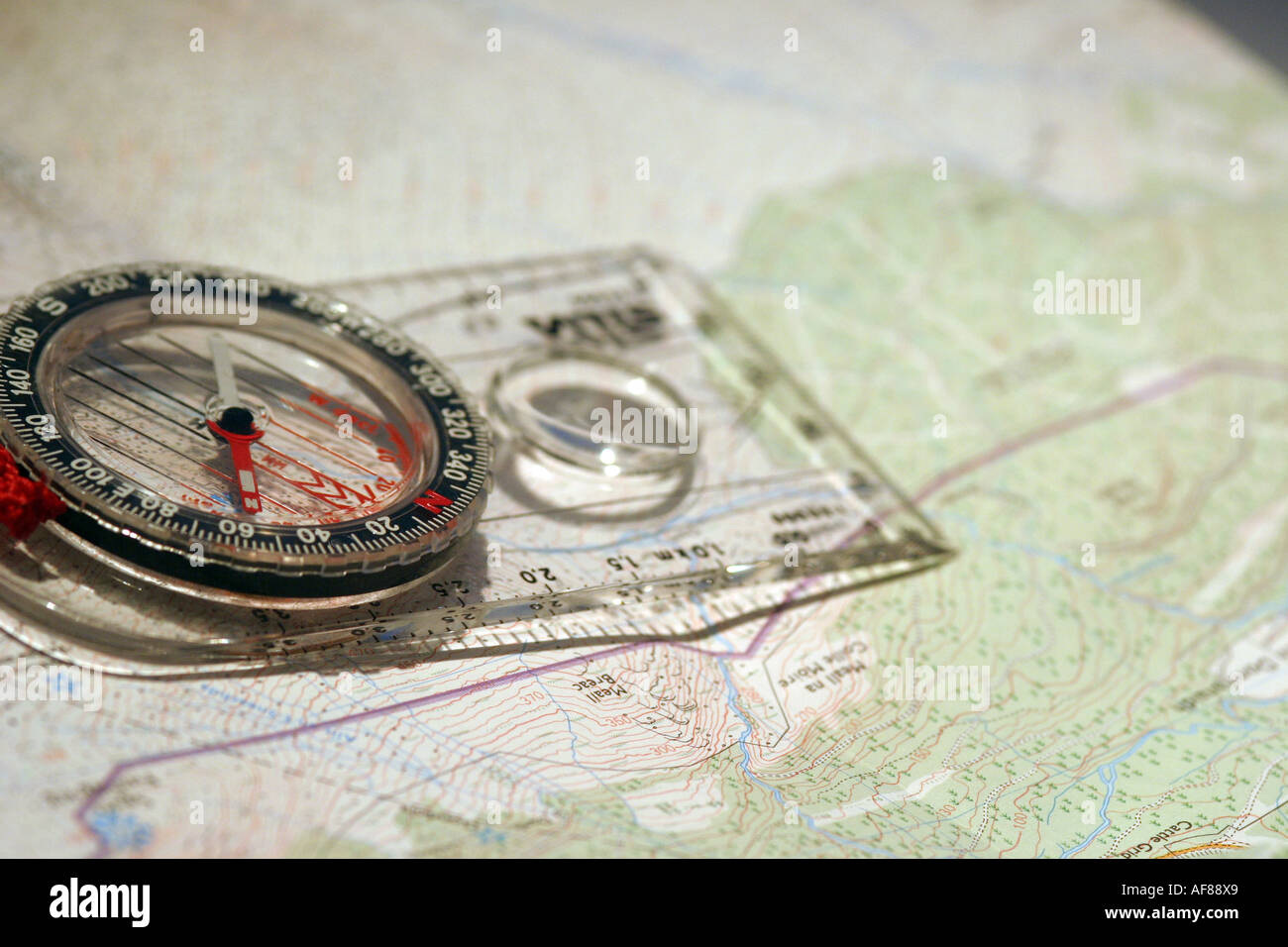 A Stock Photograph of a Compass on a Map Stock Photo - Alamy