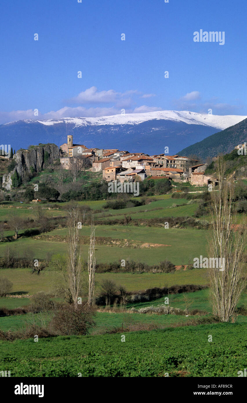 City of Peramea with range of snow covered Pyrenees, Pyrenees, Spain ...