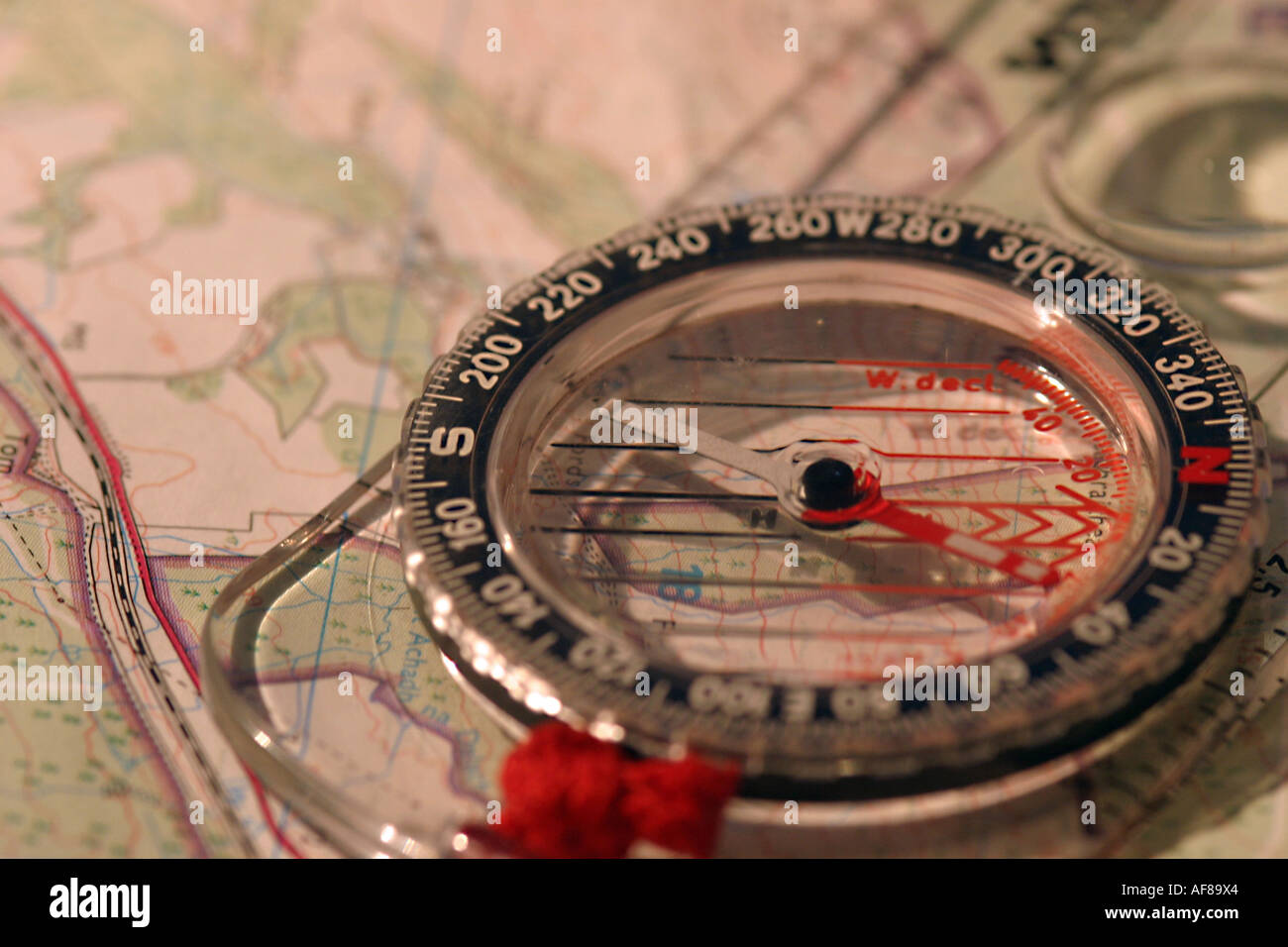 A Stock Photograph of a Compass on a Map Stock Photo - Alamy