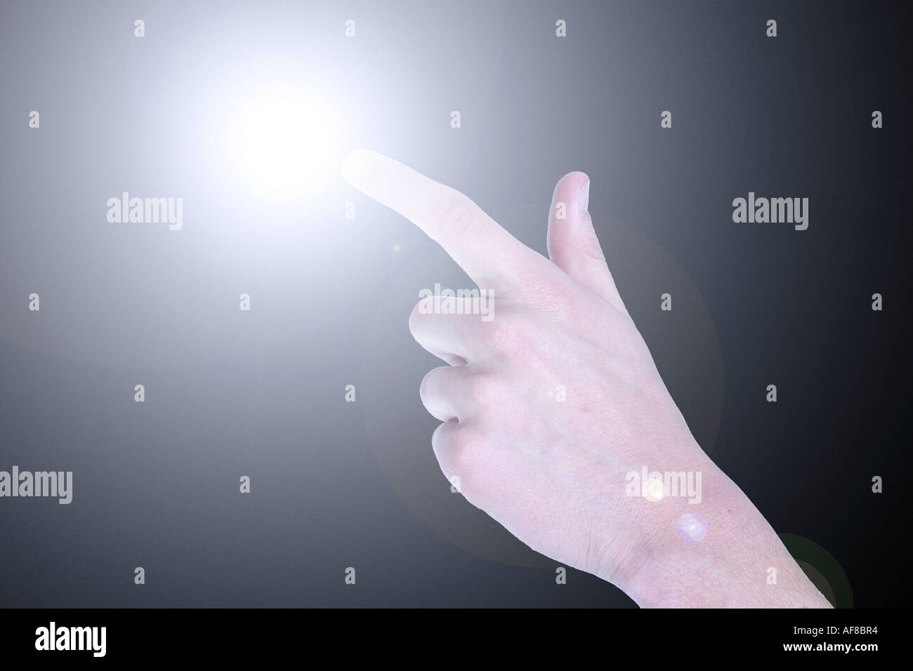 Business people touching glowing light hi-res stock photography and ...