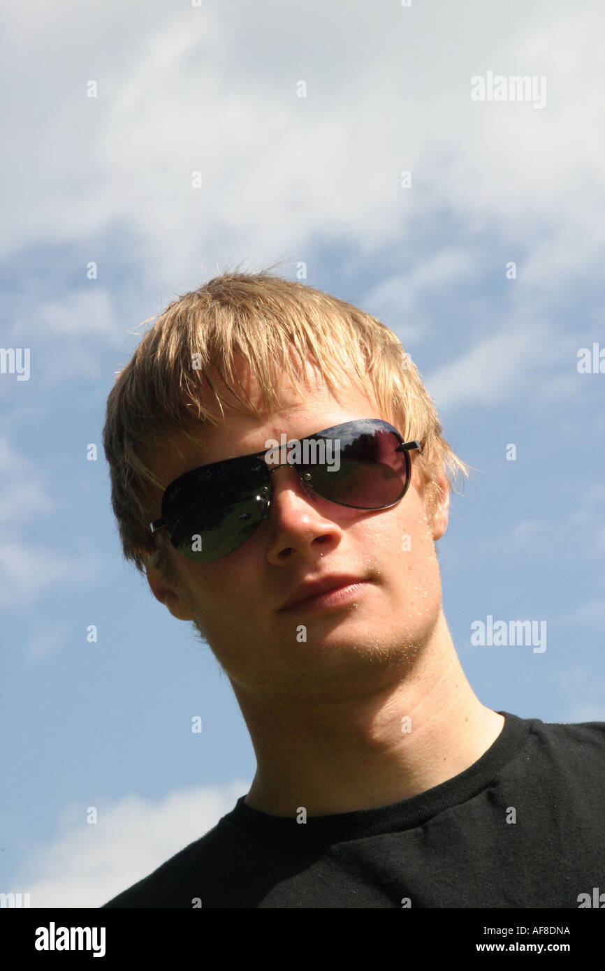 A Stock Photograph of a Student in the Summer Sun with Sunglasses on ...