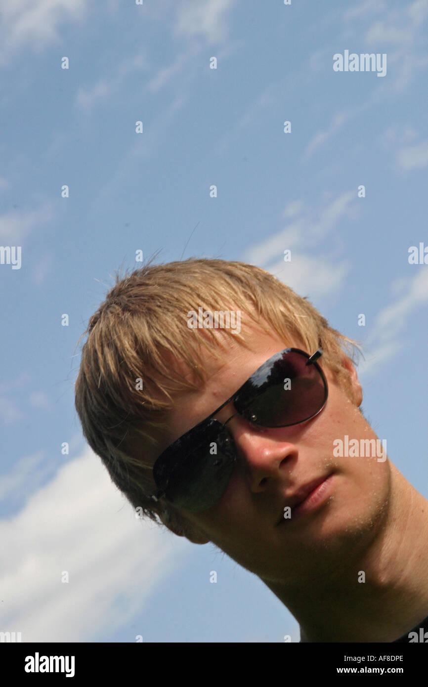 A Stock Photograph of a Student in the Summer Sun with Sunglasses on ...